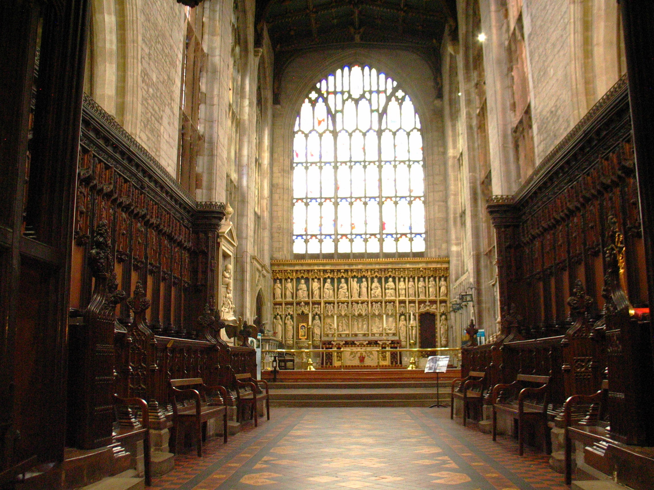 The ornate chancel, showing the oak choir stalls