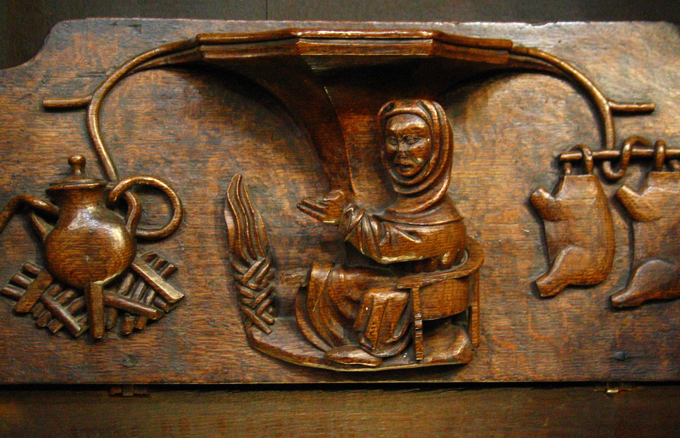 A secular seasonal scene: a man warms himself by the fire with his ...